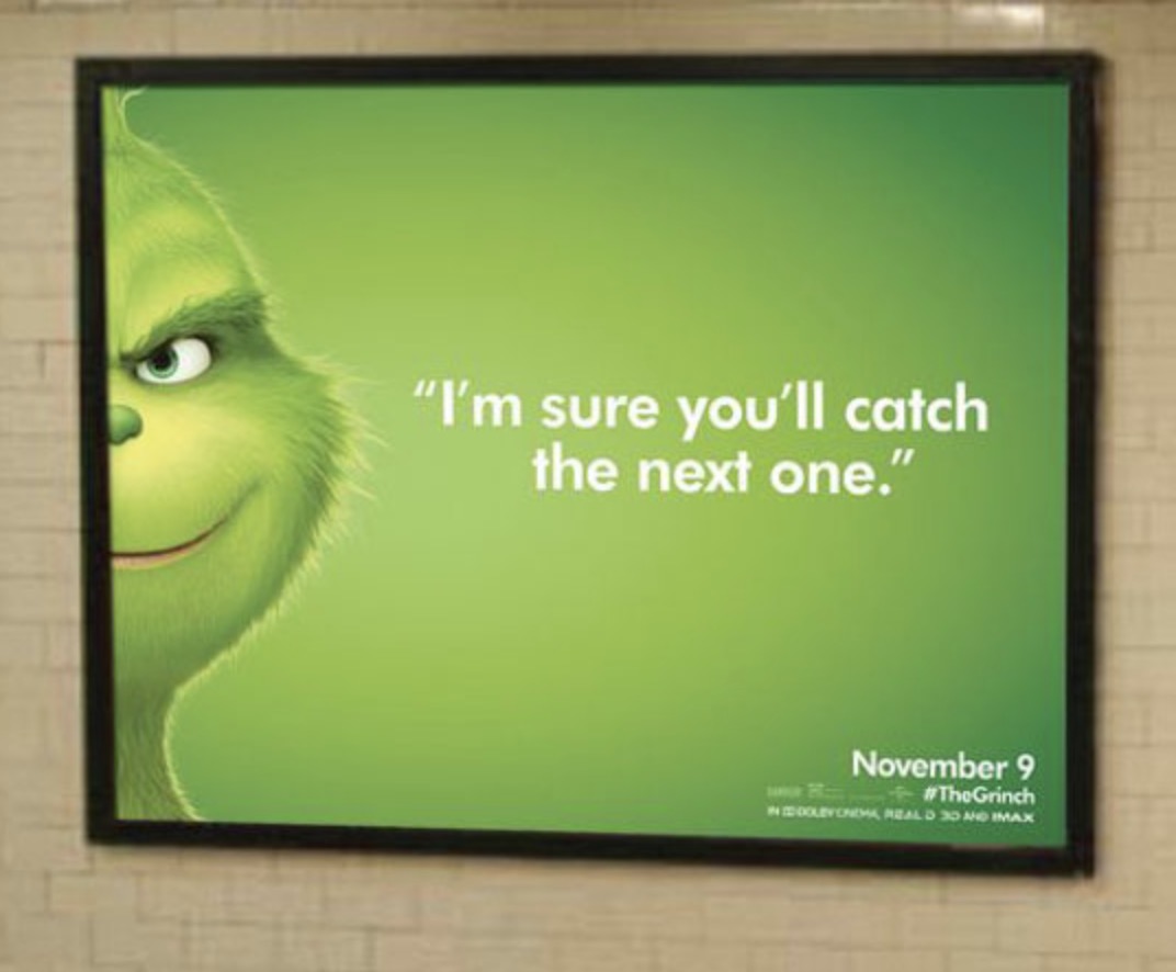 The New Grinch Movie Is Roasting American Cities With Billboards