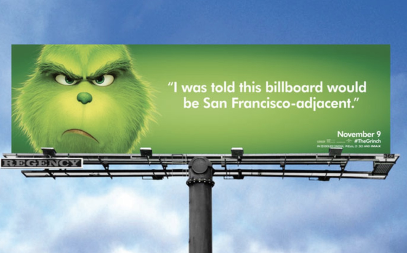 The New Grinch Movie Is Roasting American Cities With Billboards