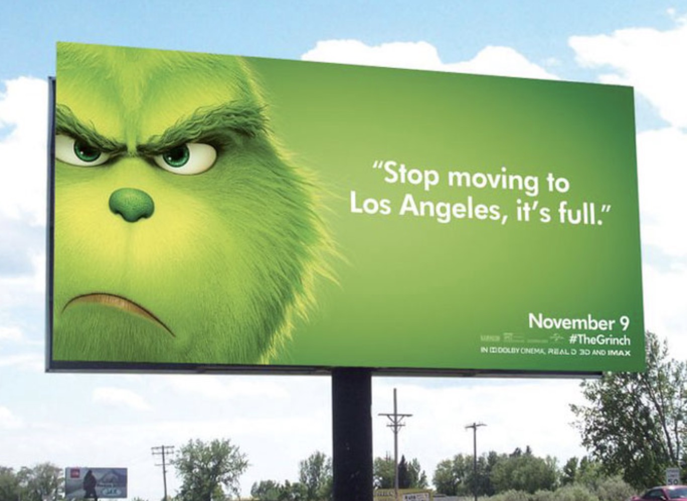 The New Grinch Movie Is Roasting American Cities With Billboards